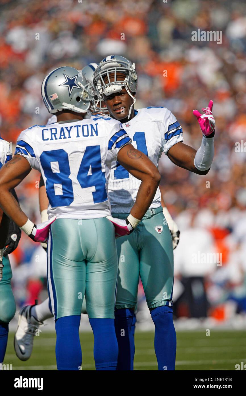 Dallas Cowboys wide receiver Roy E. Williams (11) talks with Patrick ...