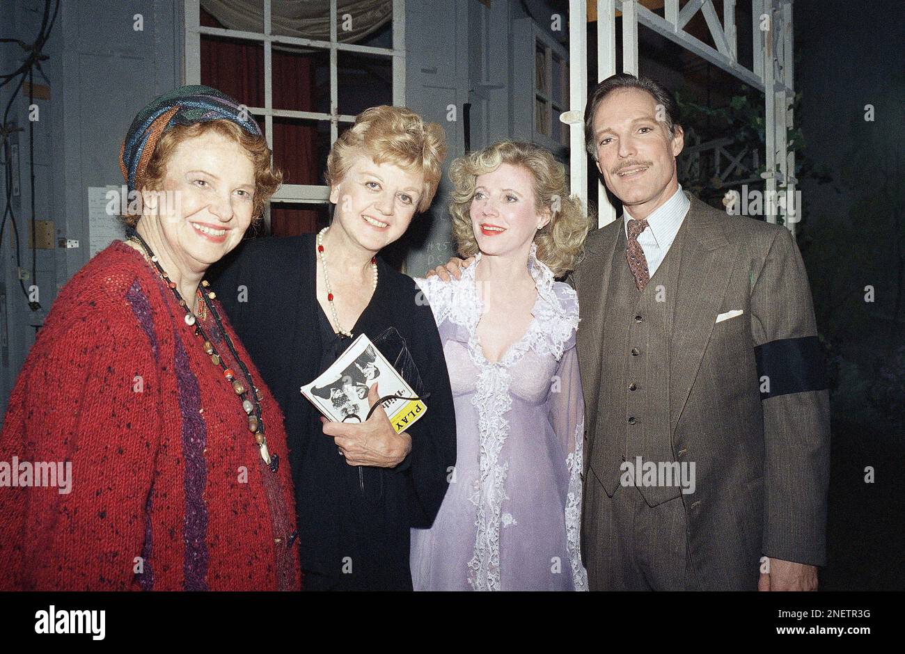 Actress Angela Lansbury, second from left, visits members of the cast ...