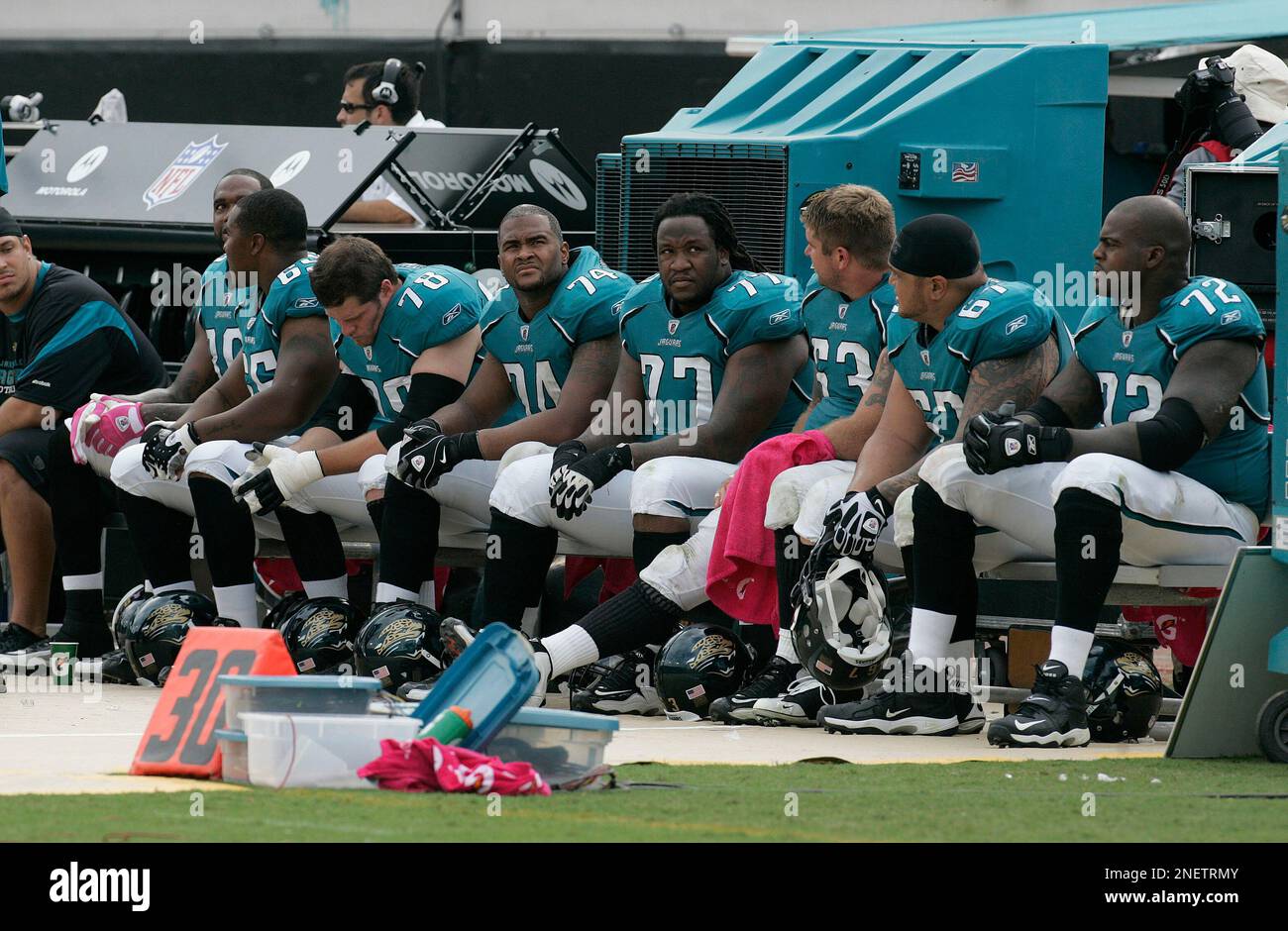 Jacksonville Jaguars offensive players on the bench during an NFL ...