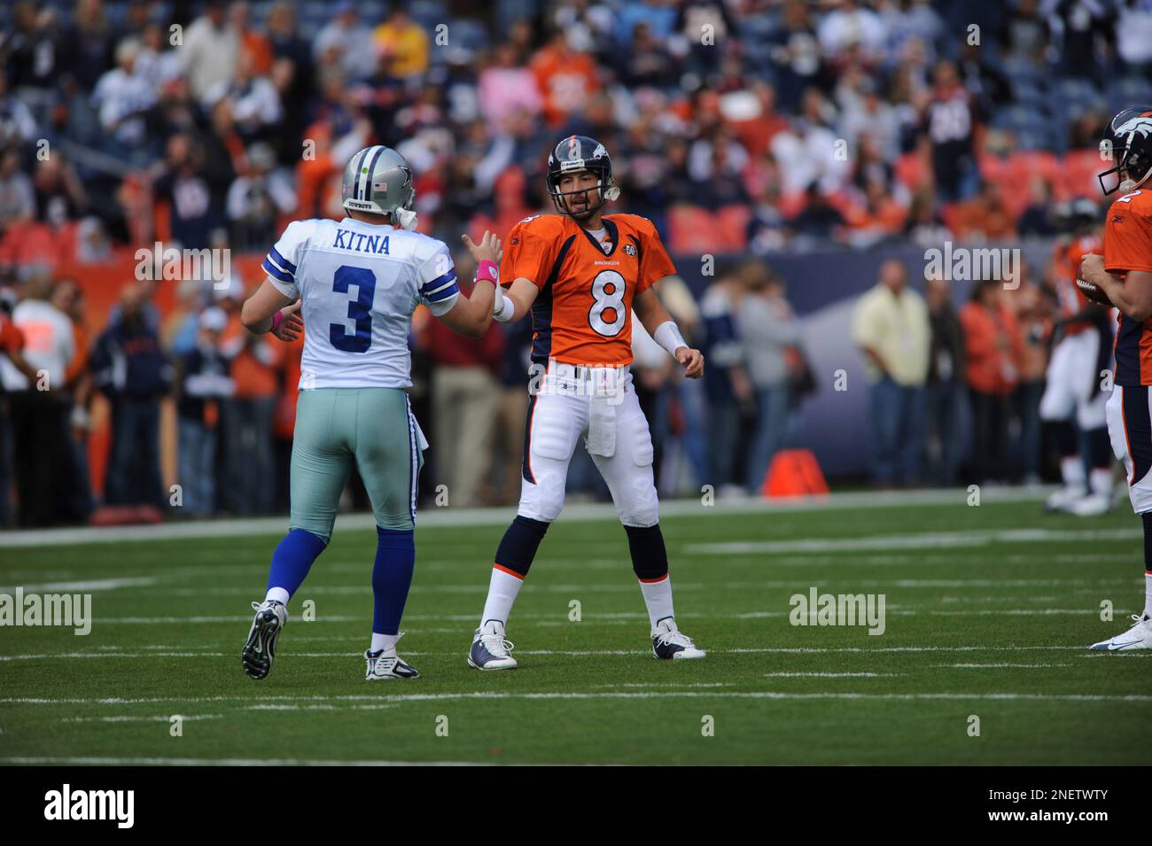 Denver Broncos quarterback Kyle Orton (8) greets Dallas Cowboys ...