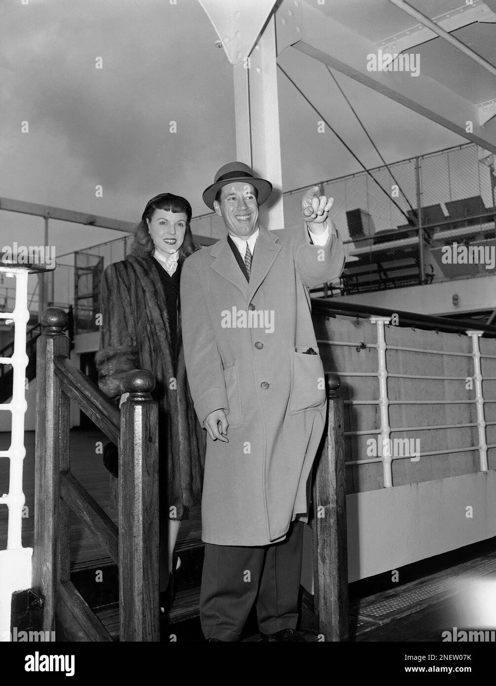 Cleveland Indians’ hurler Bob Feller and his wife Virginia stand on ...