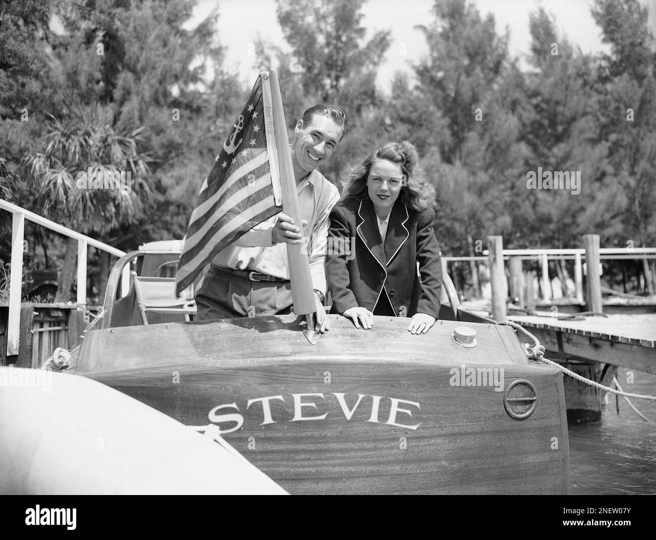Bob Feller, Cleveland Indians pitcher with his wife and his cruiser at ...