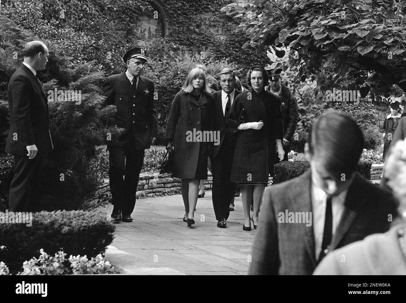 Looking solemn, the Charles Percy family leaves Kenilworth Union Church ...