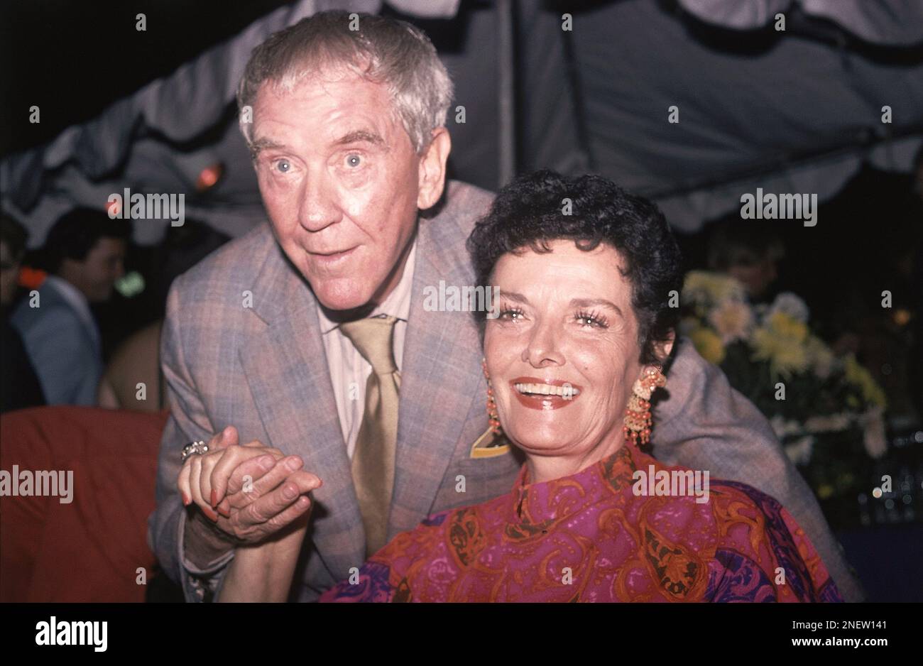 Actors Burgess Meredith, left, and Jane Russell pose for photographers ...