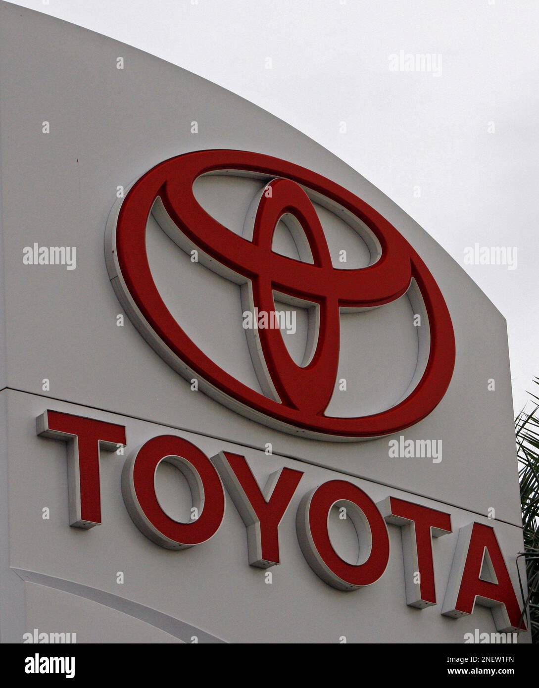 The Toyota logo is shown at a local dealership in Miami, Wednesday ...