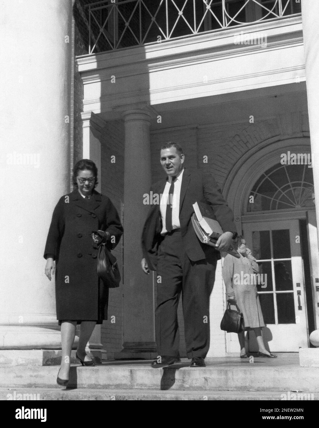Mrs. Barbara Powers, 28, leaves the Baldwin County courthouse with her ...