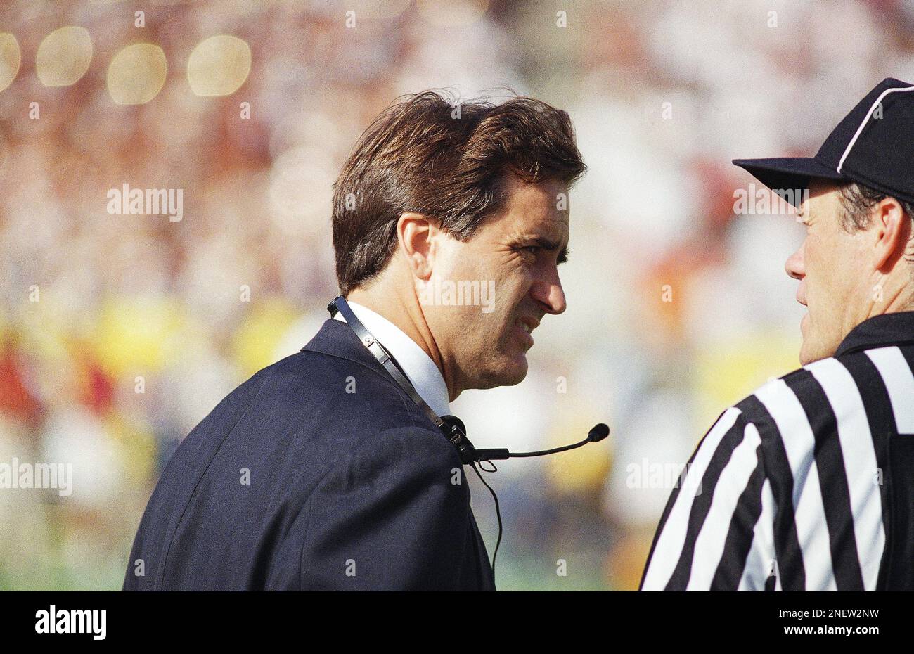Cal head football coach Steve Mariucci gives an official his opinion ...