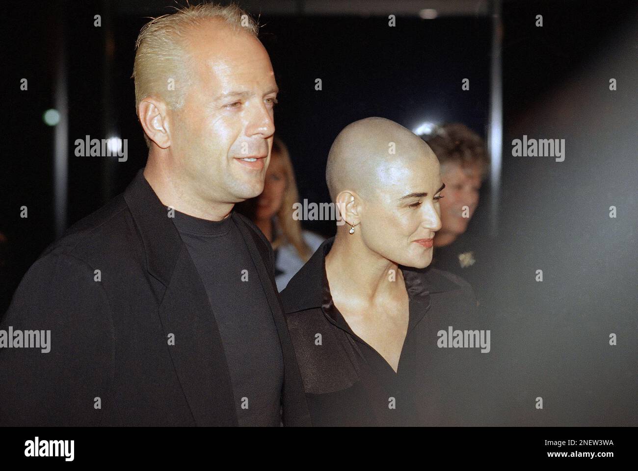Actors Bruce Willis, left, and Demi Moore arrive for the premiere of ...