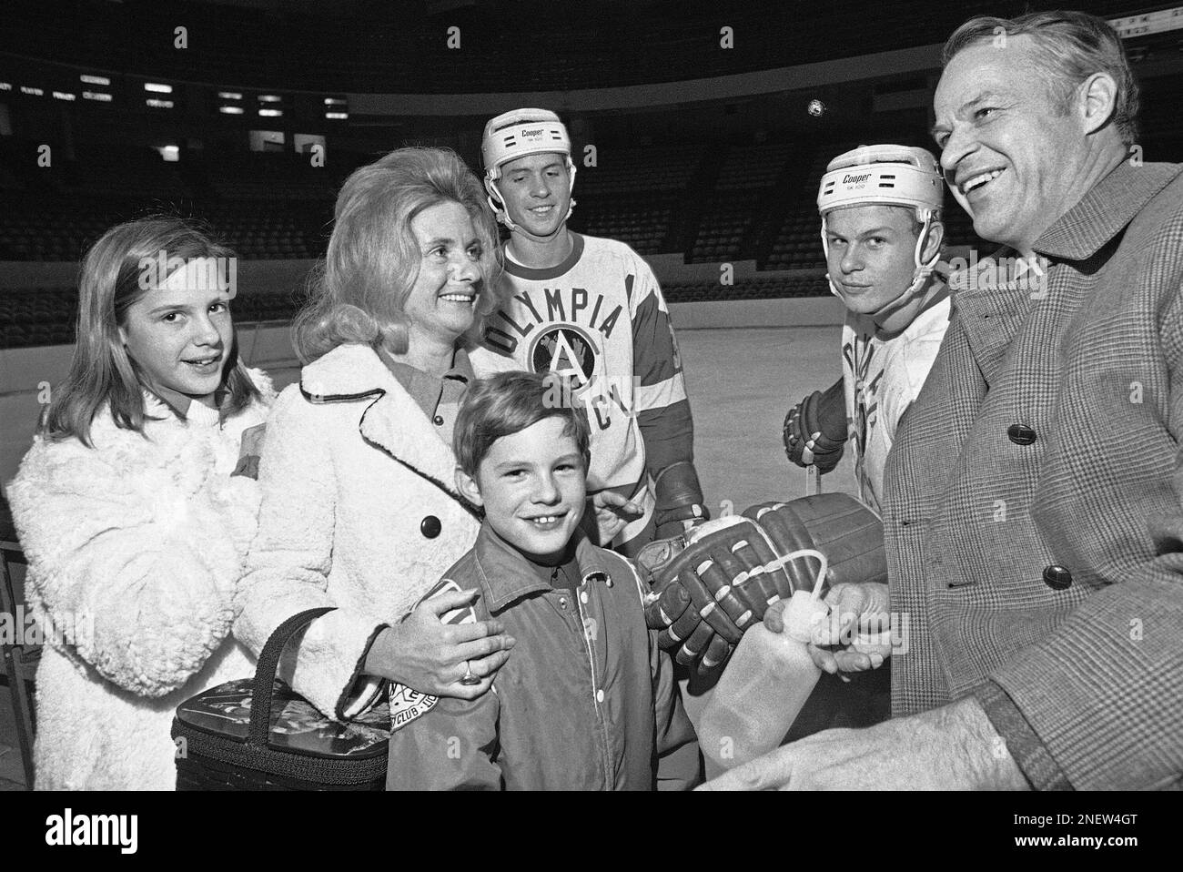 Gordie Howe with his Wing hockey player sons Marty (9) and Mark (3) in ...