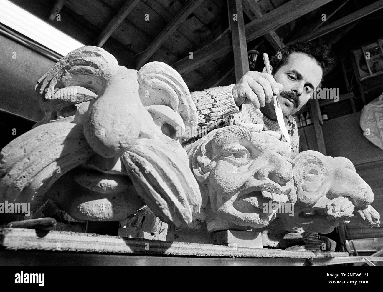 Stonecarver Constantine Seferlis works on three of his stone ...