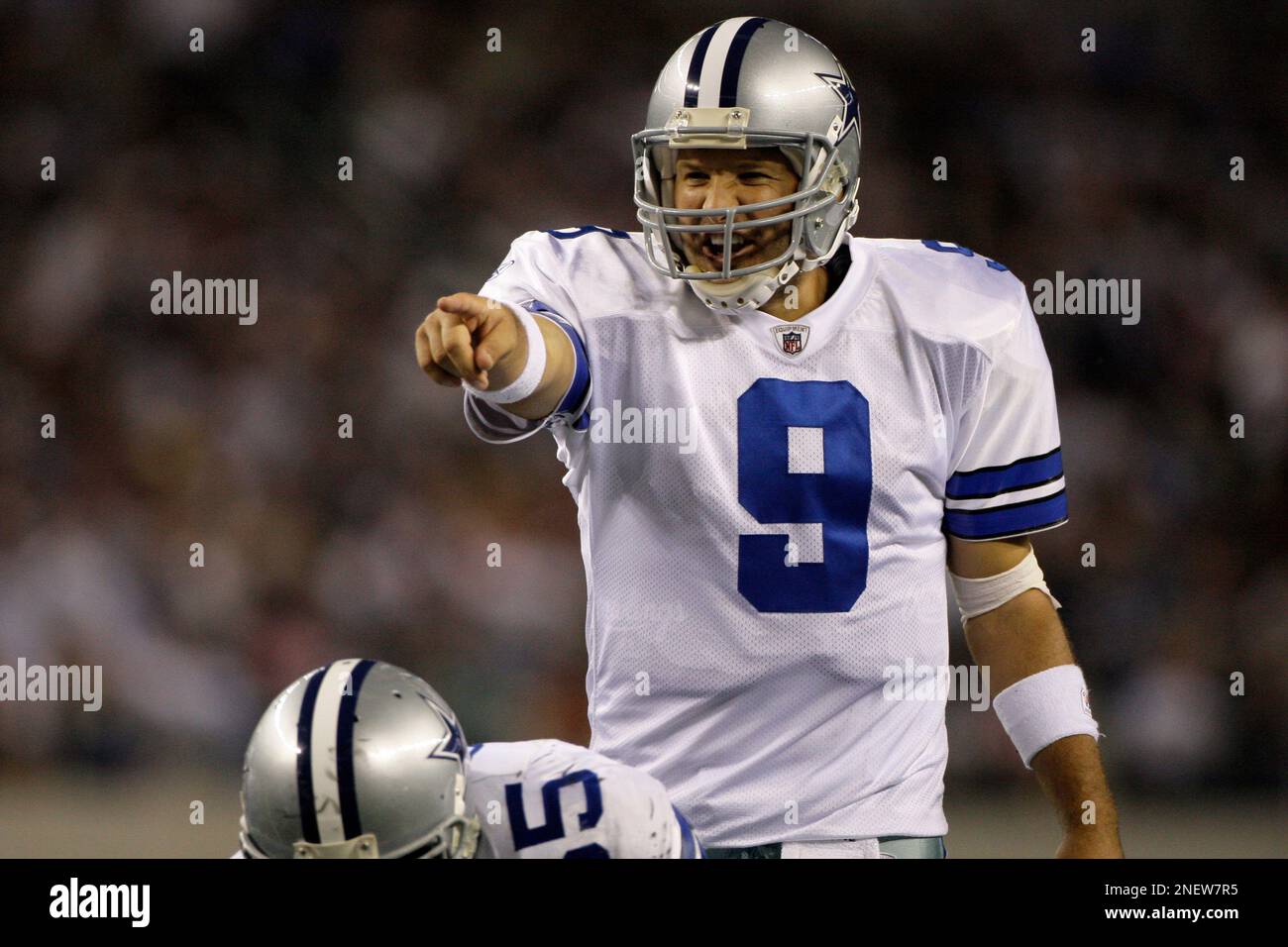 Dallas Cowboys quarterback Tony Romo (9) calls instructions at the line ...