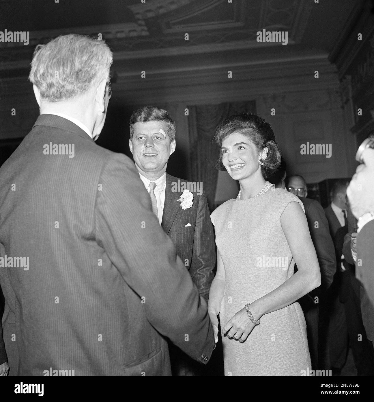 President John Kennedy and Mrs.Jacqueline Kennedy bid good night to ...