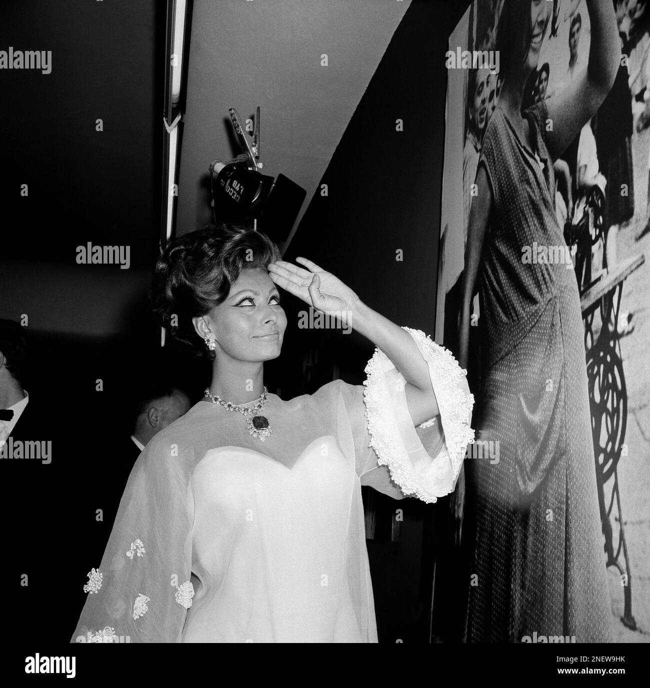 Italian movie actress Sophia Loren gives salute of recognition to giant ...