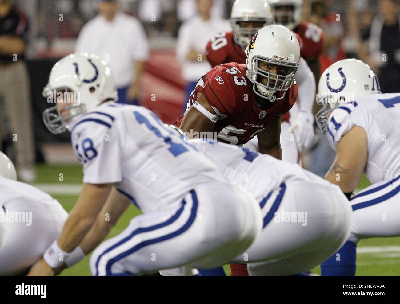 Arizona Cardinals' Clark Haggans keeps an eye on Indianapolis Colts ...