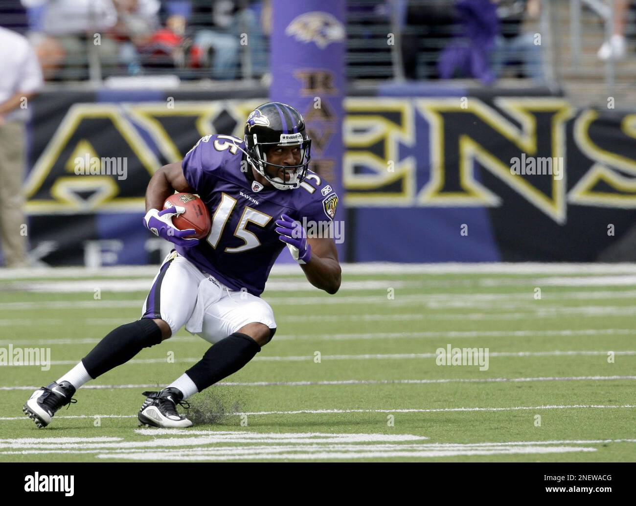 Baltimore Ravens wide receiver Kelley Washington (15) runs with the ...