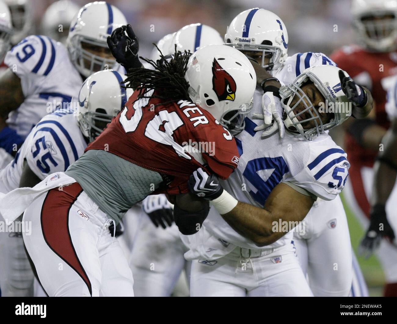Arizona Cardinals running back Tim Hightower (34) is stopped by ...