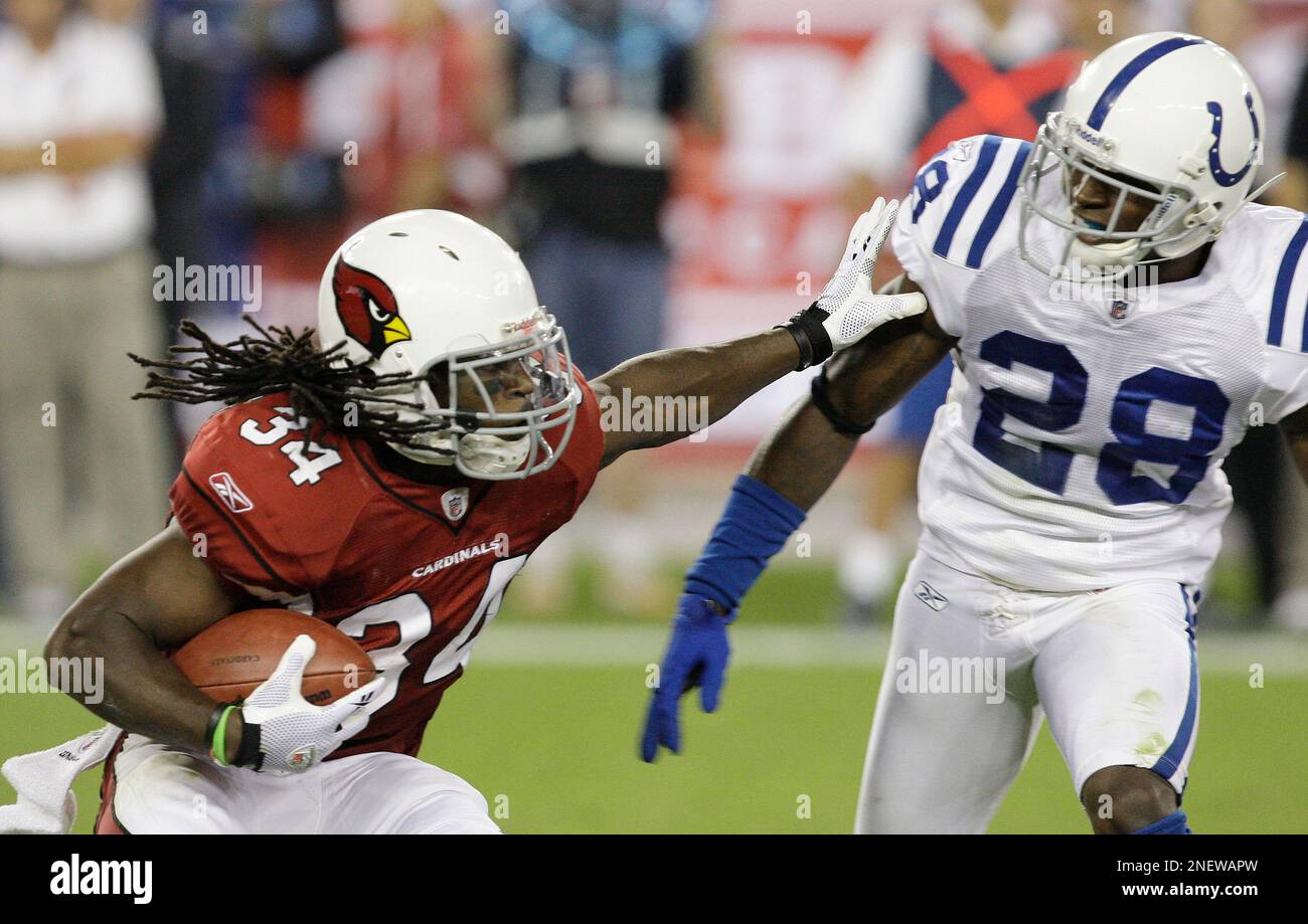 Indianapolis Colts' Marlin Jackson (28) slows Arizona Cardinals' Tim ...