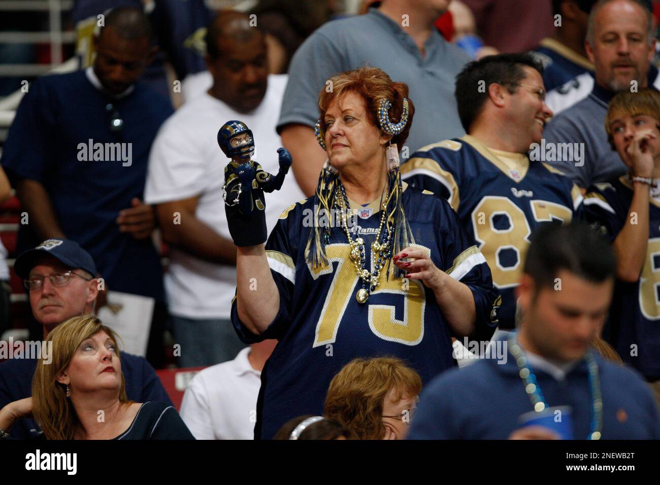 A St. Louis Rams fan cheer during the third quarter of an NFL football ...