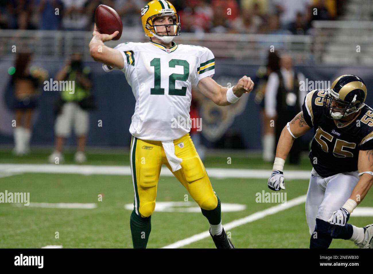 Green Bay Packers quarterback Aaron Rodgers drops back to throw as St ...