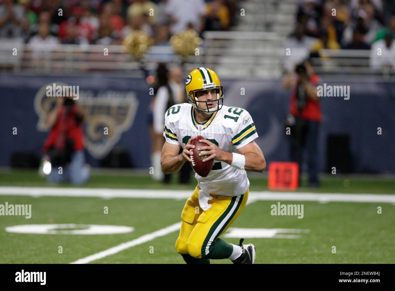 Green Bay Packers quarterback Aaron Rodgers drops back to throw during ...