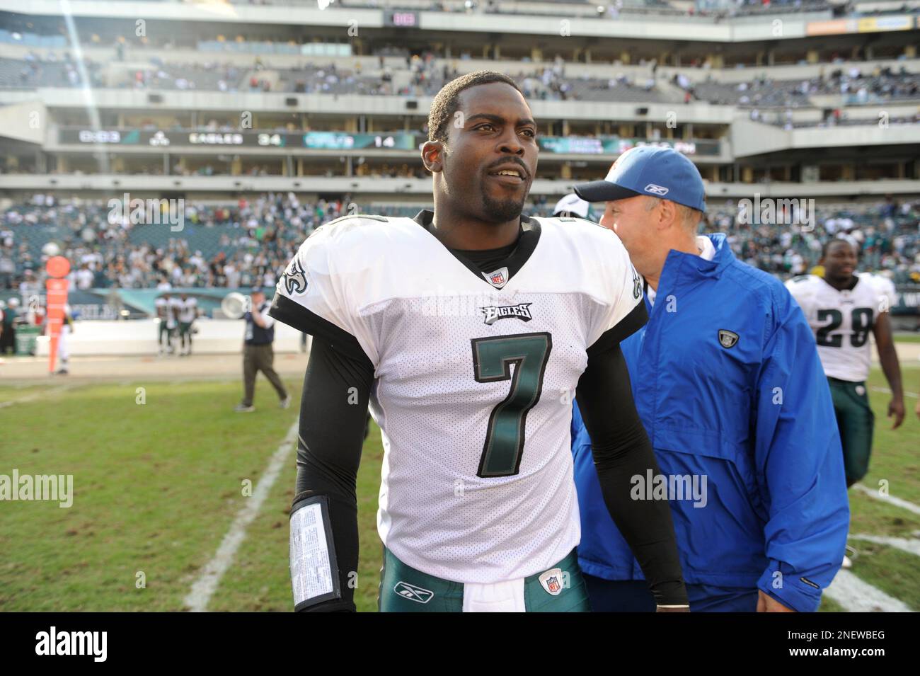 Philadelphia Eagles quarterback Michael Vick walks onto the field after ...