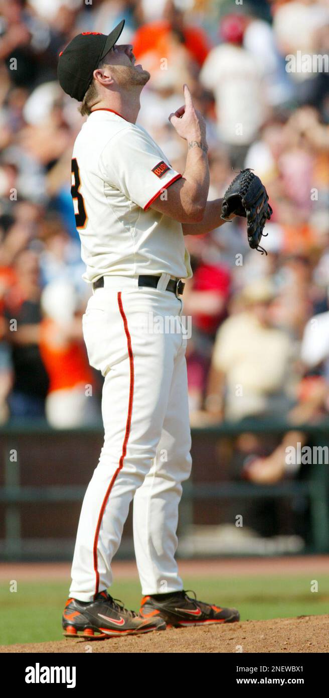 San Francisco Giants pitcher Brian Wilson gestures after the final out ...