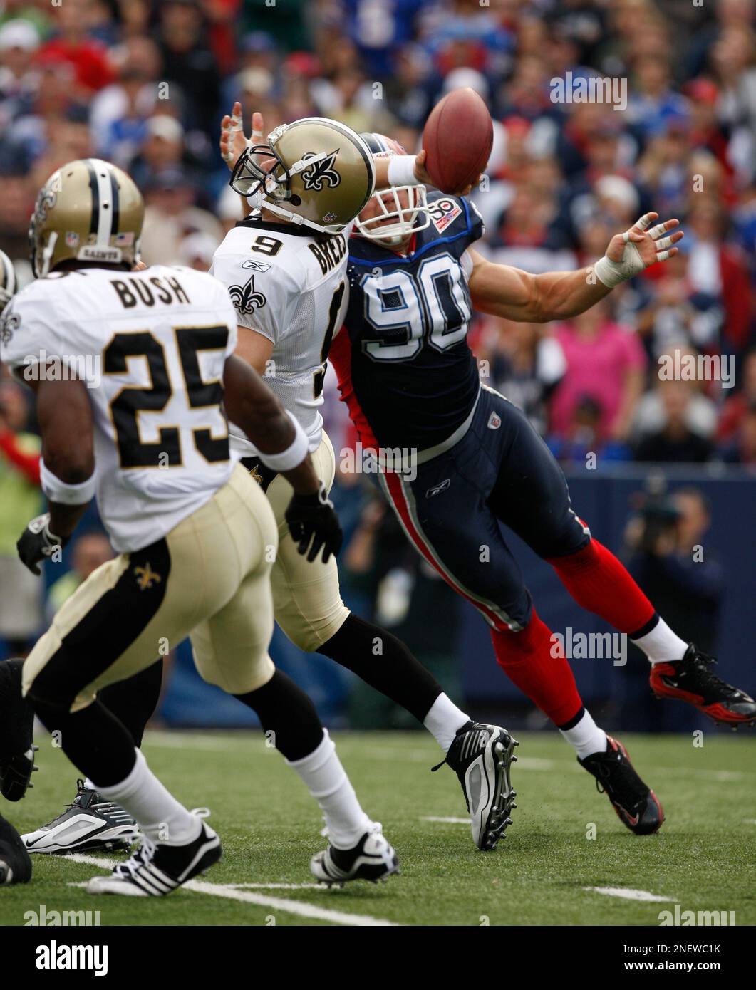 Buffalo Bills' Chris Kelsay (90) pressures New Orleans Saints' Drew ...