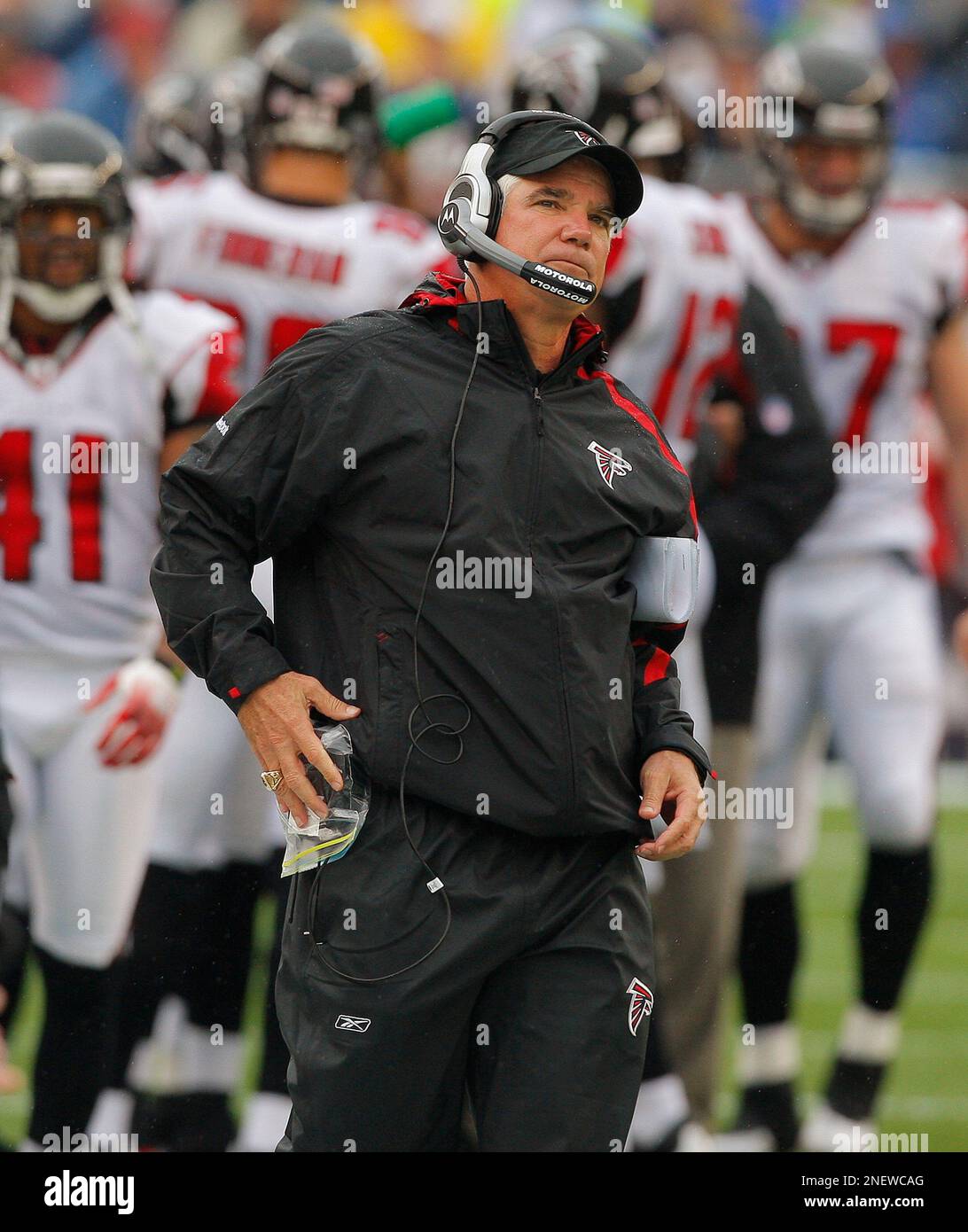 Atlanta Falcons head coach Mike Smith walks the sideline during their ...