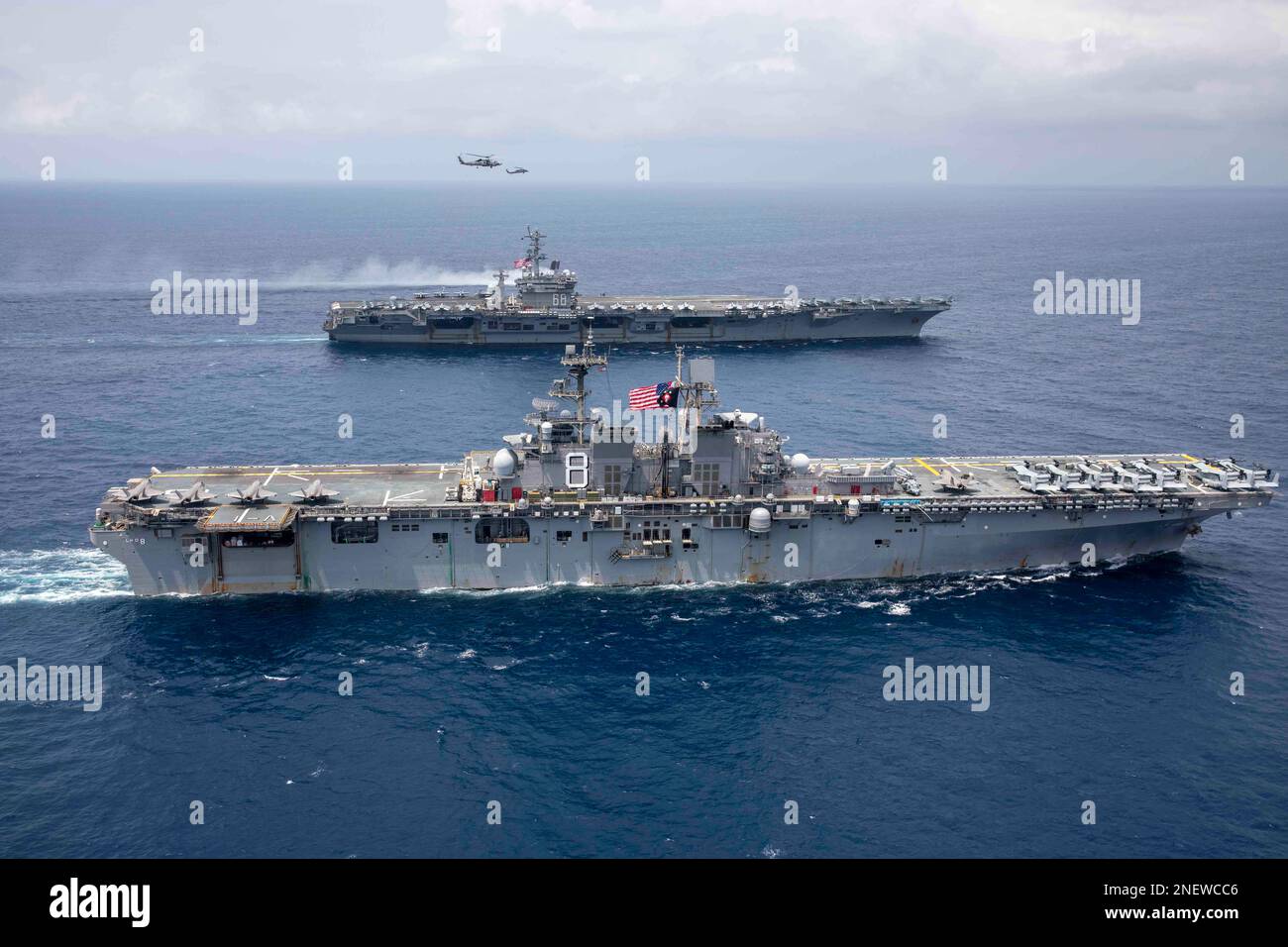 Amphibious assault ship USS Makin Island (LHD 8) and aircraft carrier ...