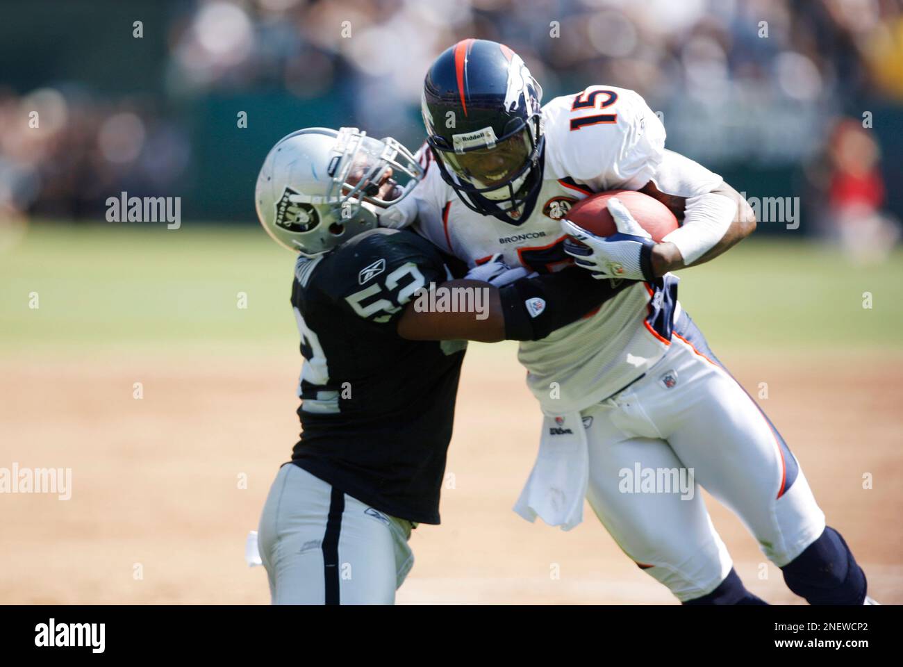 Oakland Raiders linebacker Kirk Morrison (52) tackles Denver Broncos ...
