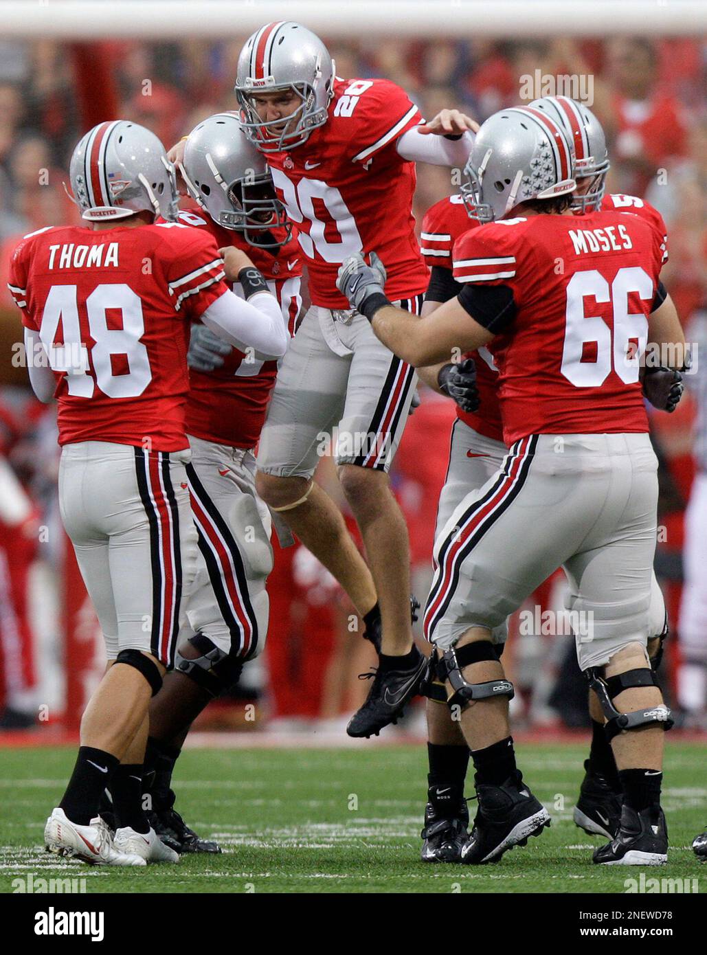 Ohio State's Aaron Pettrey, center, celebrates after kicking a field ...