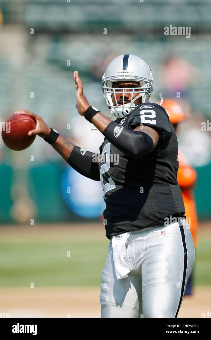 Oakland Raiders quarterback JaMarcus Russell (2) passes before game ...