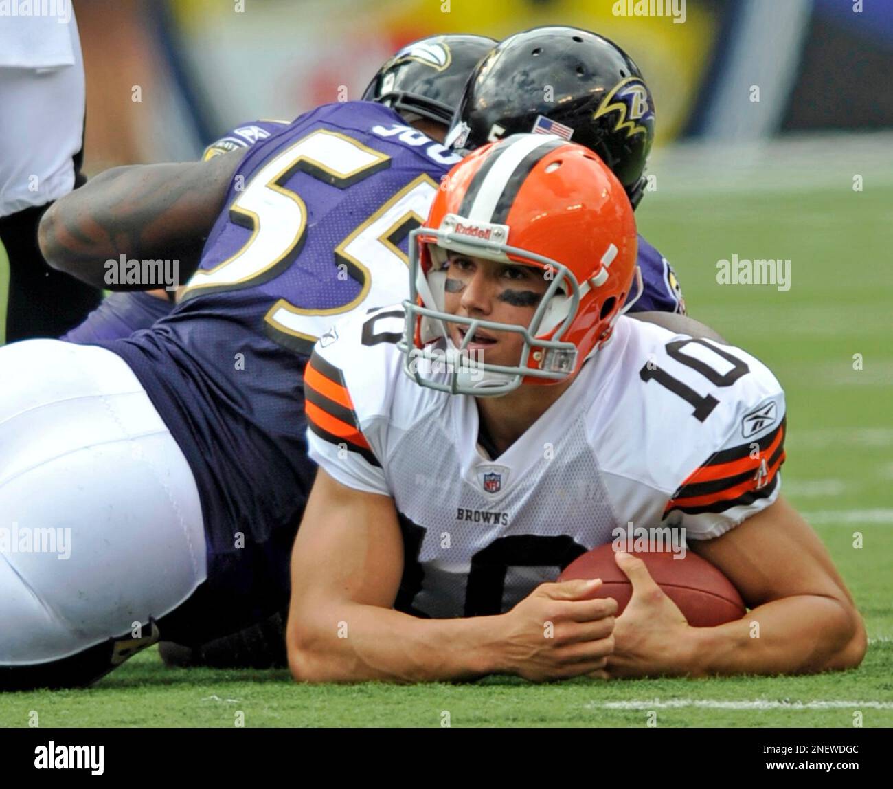 Cleveland Browns quarterback Brady Quinn (10) looks up after being ...