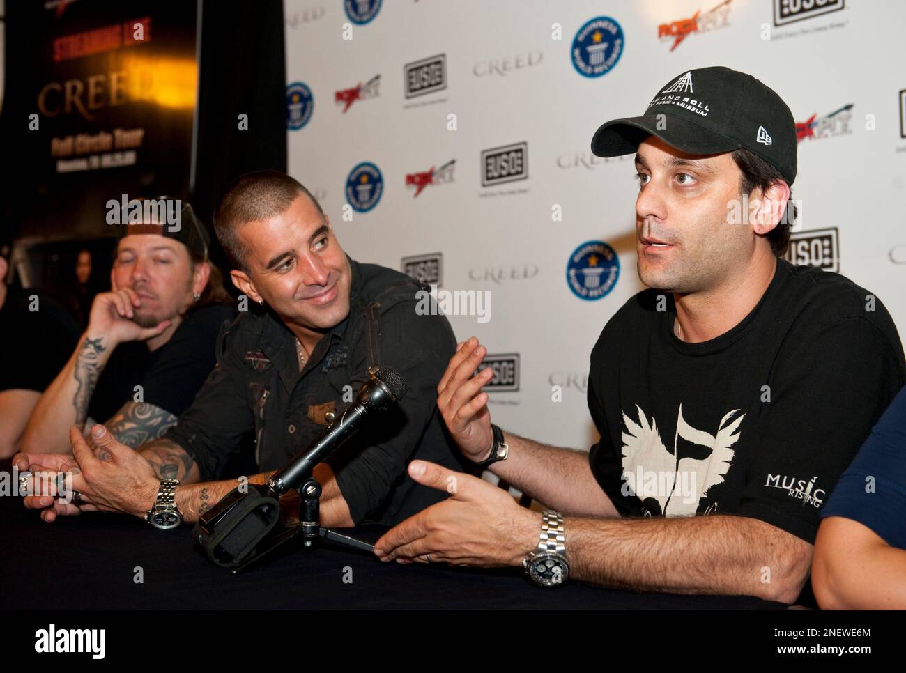 L-R Creed drummer Scott Phillips, lead singer Scott Stapp and director ...