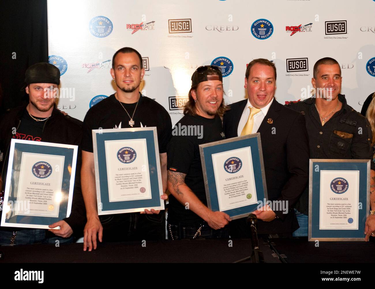 L-R Creed bassist Brian Marshall, guitarist Mark Tremonti, drummer ...