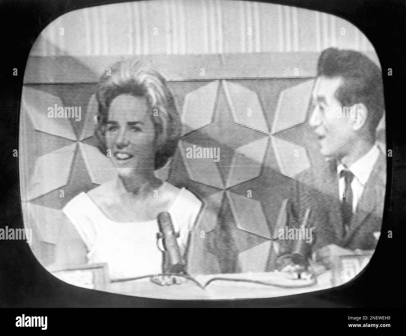 Photo shot off television of Mrs. Ethel Kennedy, center, talking with ...