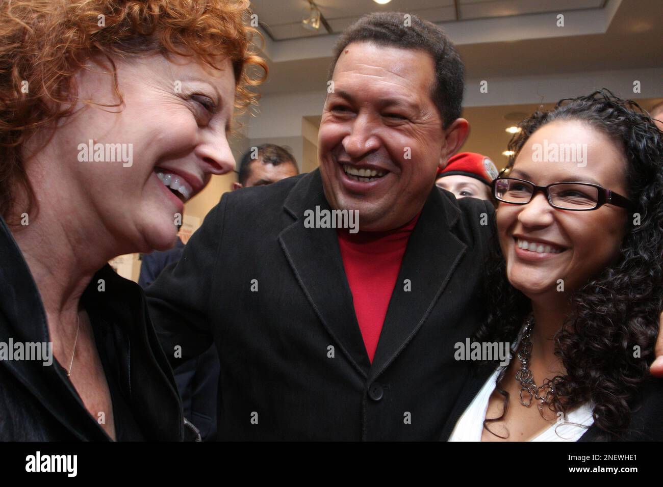 President of Venezuela Hugo Chavez, center, shares a laugh with Susan ...