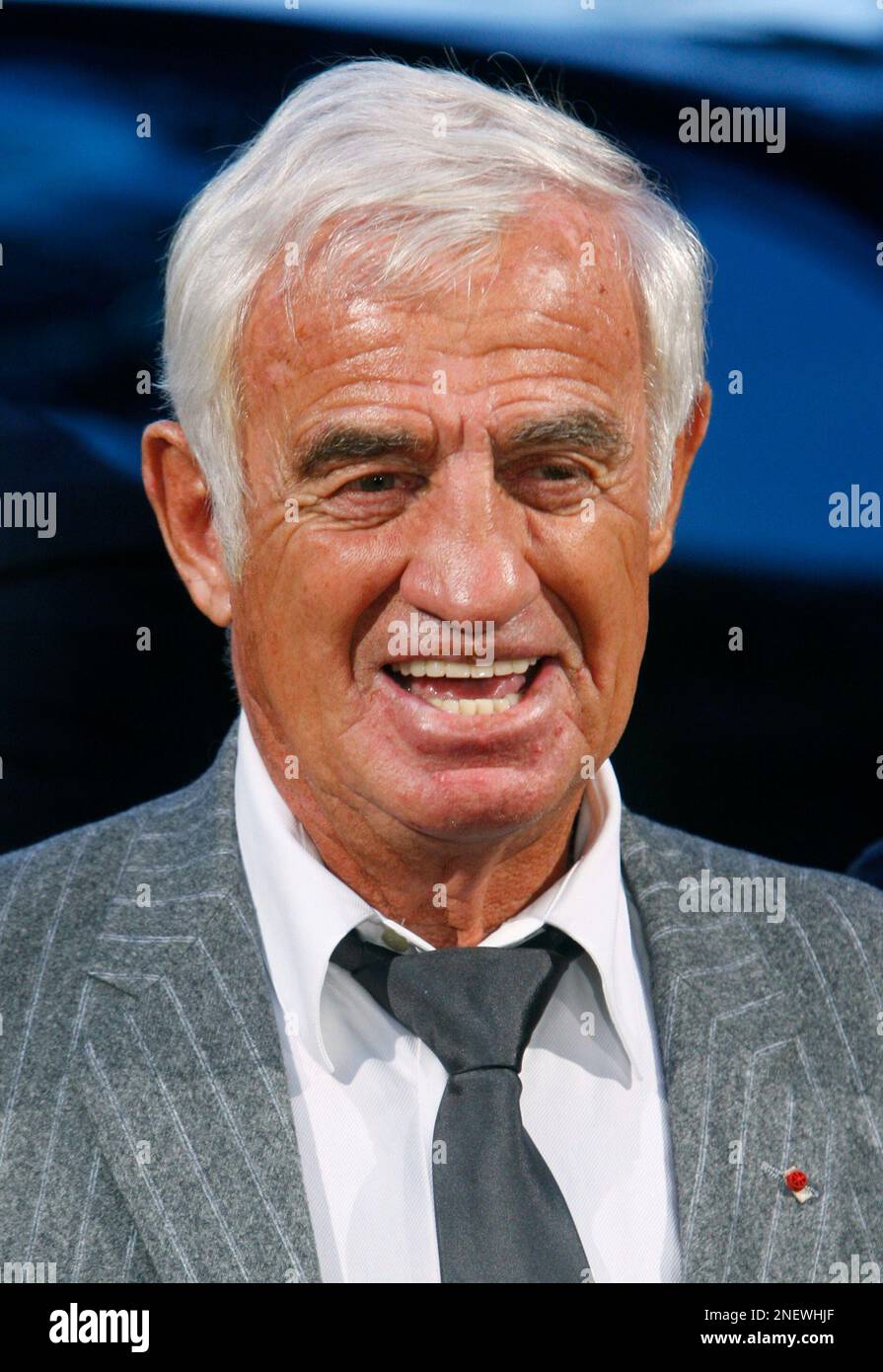 French actor Jean-Paul Belmondo smiles as he arrives for a screening of ...