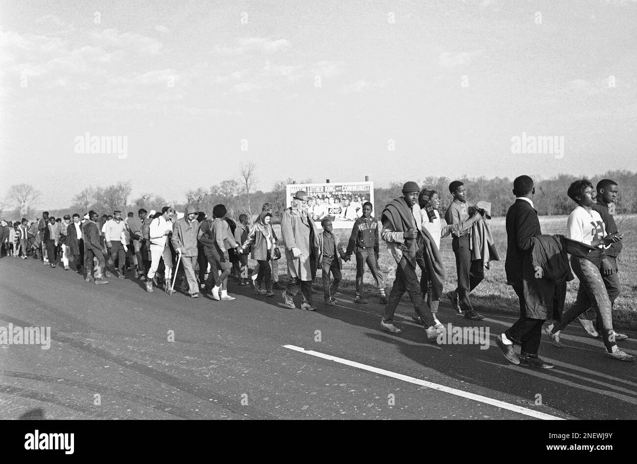 Civil rights marchers pass billboard along highway attacking their ...