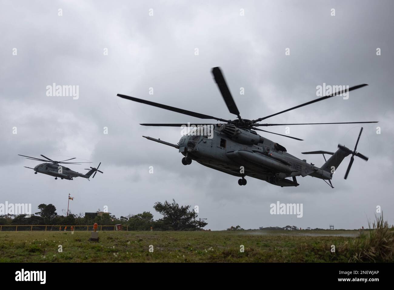 Two U.S. Marine Corps CH-53E Super Stallions with Marine Aircraft Group ...