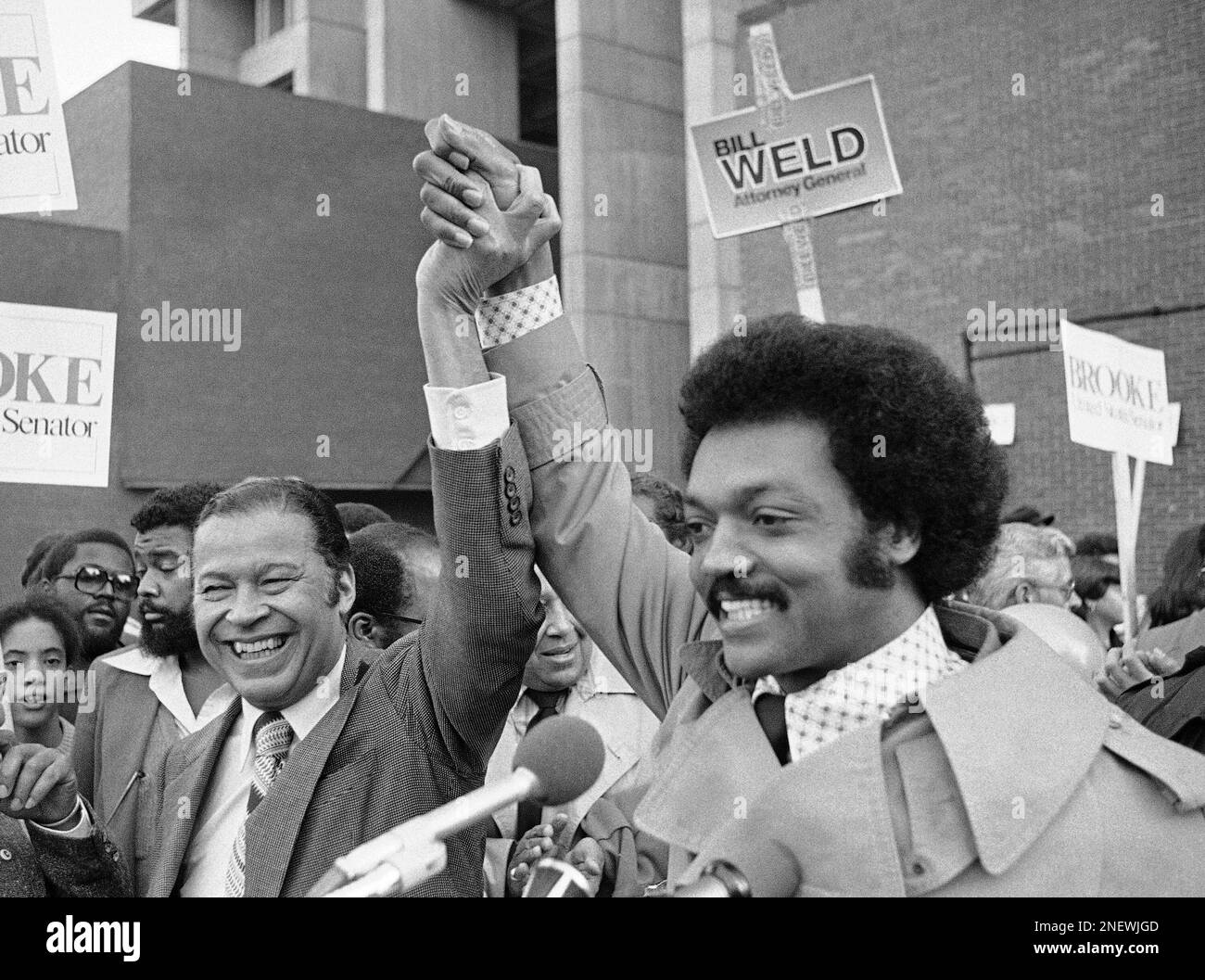 Rep. Jesse Jackson, right, claps hands with Sen. Edward Brooke as the ...