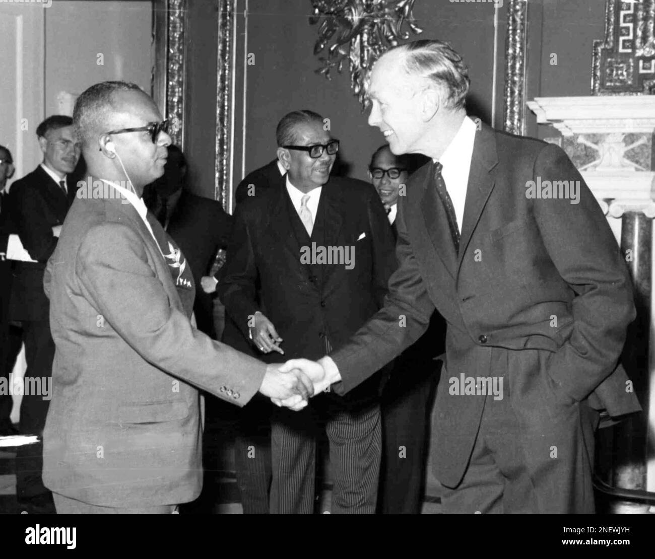 Prime Minister of Trinidad Dr. Eric Williams, left, is greeted by ...