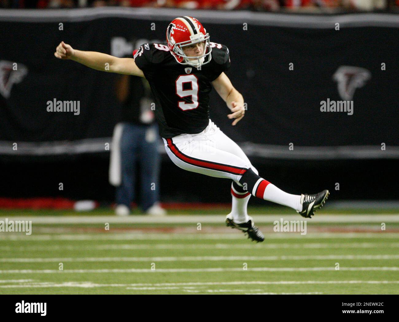 Atlanta Falcons kicker Michael Koenen kicks off against the Carolina ...
