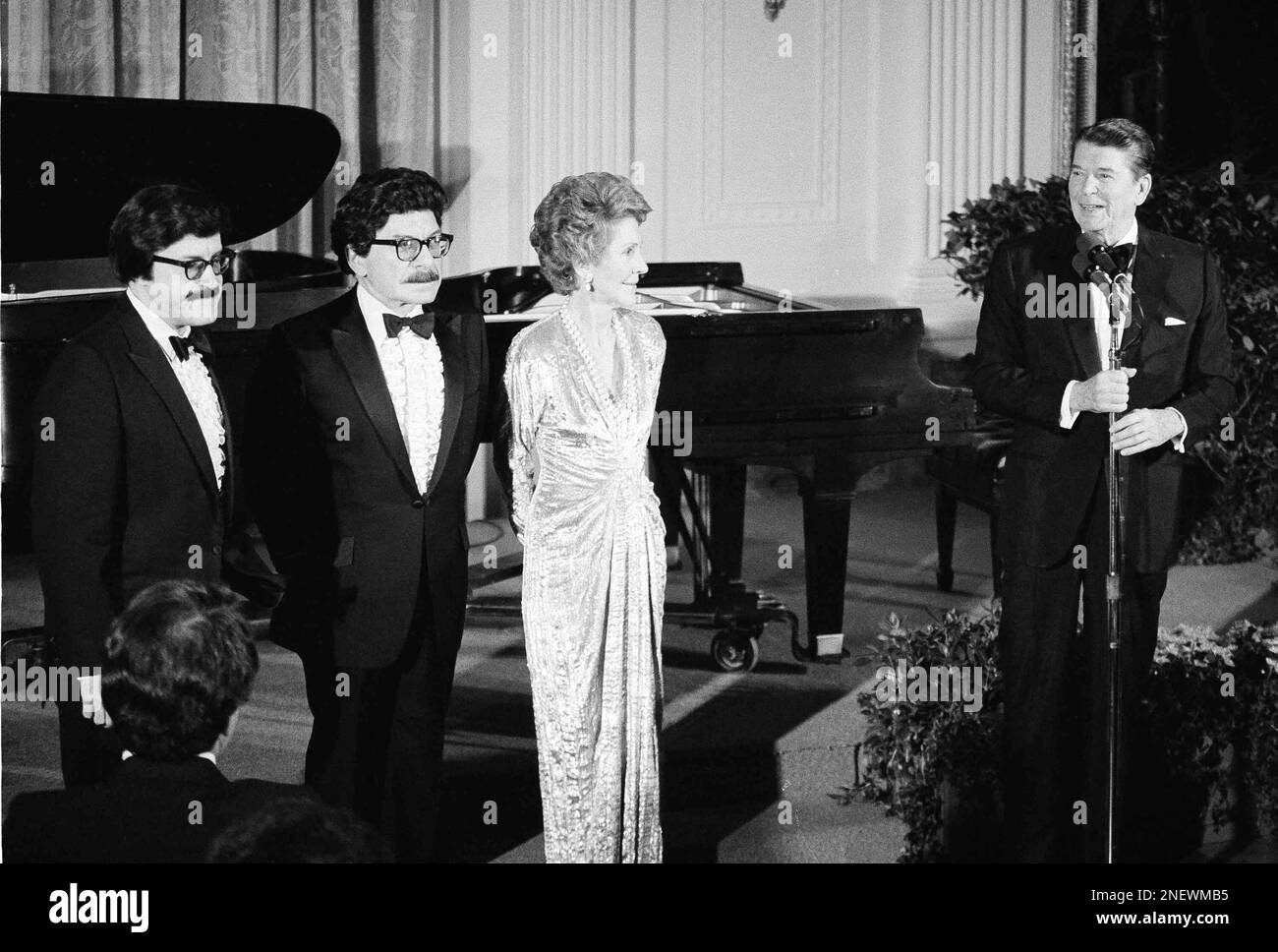 U.S. President Ronald Reagan and First Lady Nancy greet pianists Arthur ...