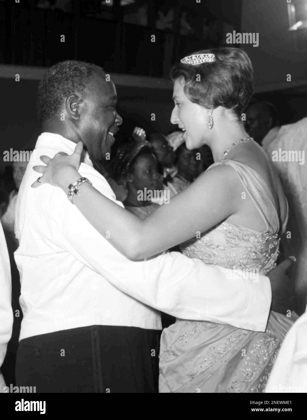 Britain's Princess Alexandra of Kent dances with Sir Adetokunboh ...