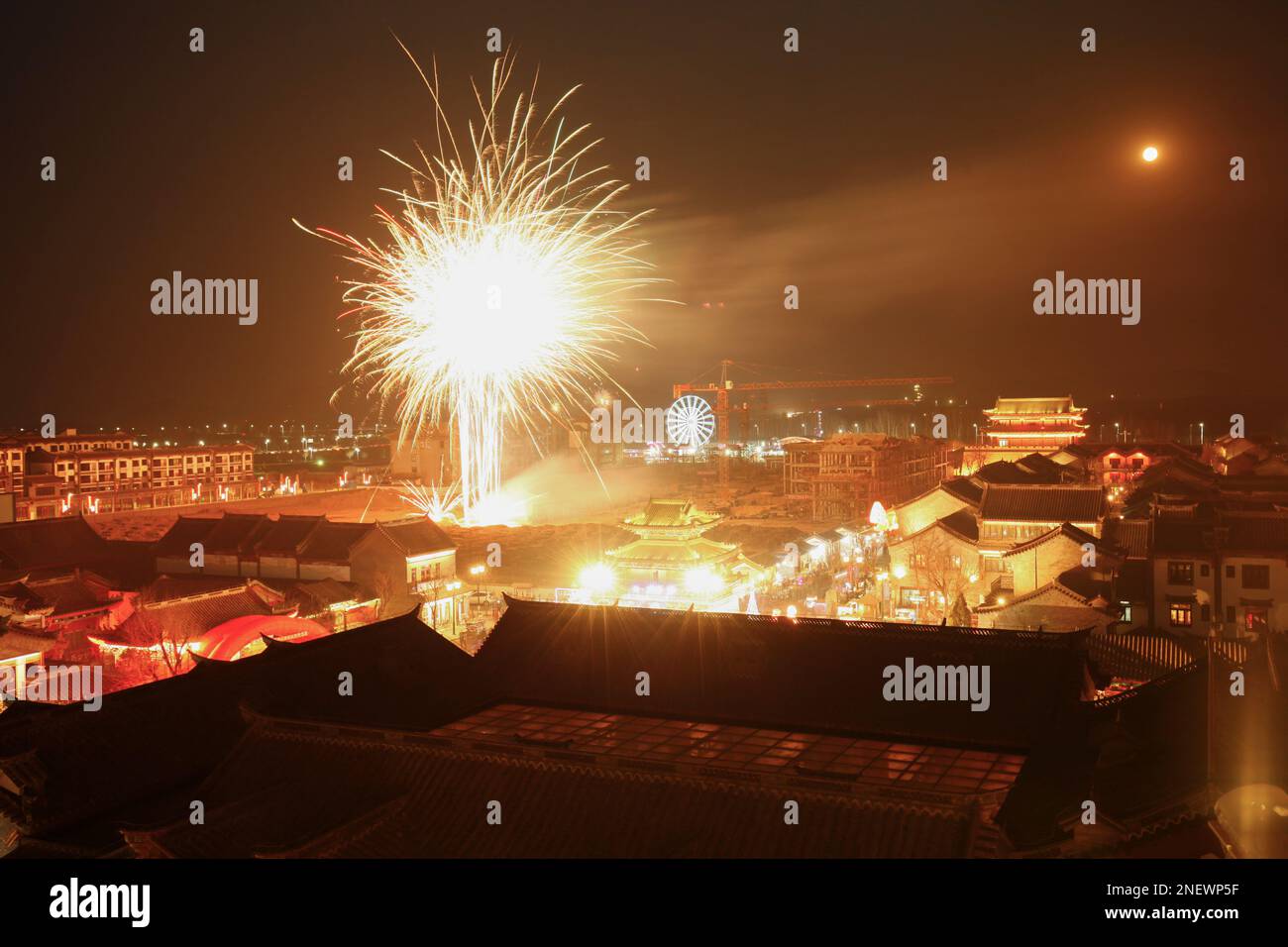 Fireworks up ancient buildings at night, in China Stock Photo - Alamy