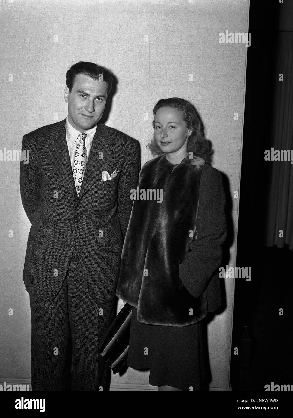 Artie Shaw and his bride of 3 weeks looking at a study in solitude by ...