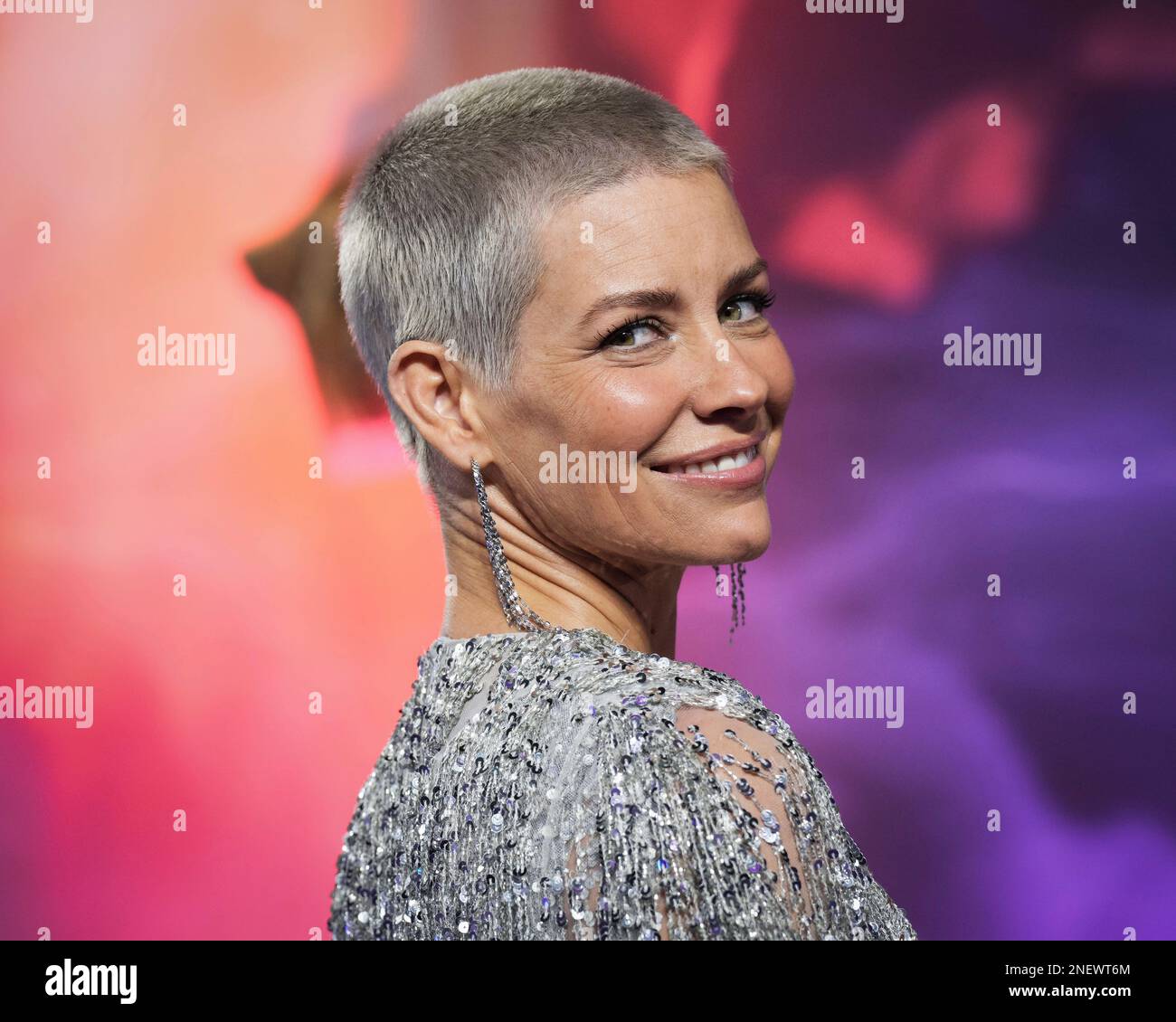 Evangeline Lilly poses for photographers upon arrival for the premiere ...
