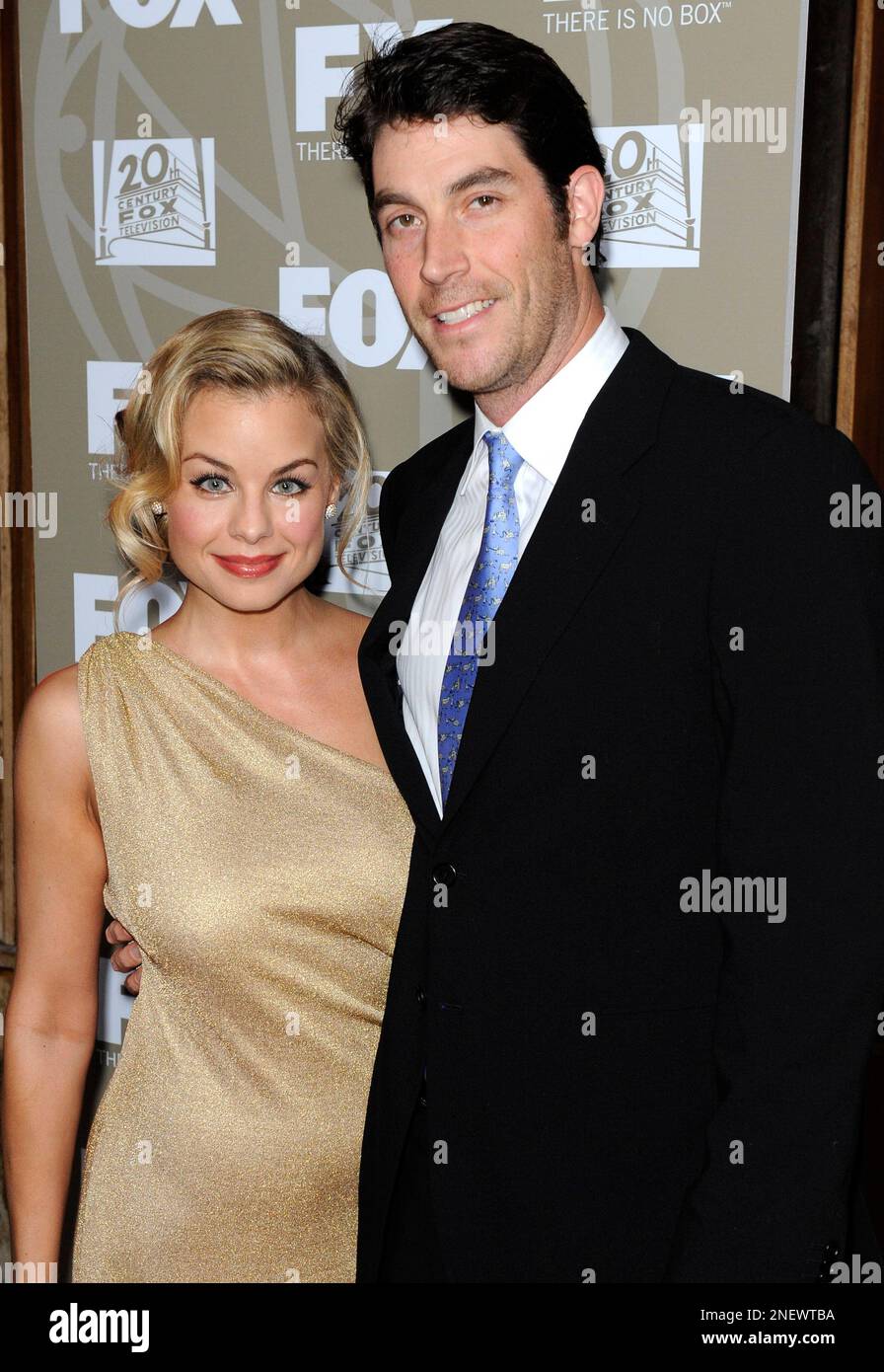 Actor John Viener and his wife actress Jessica Collins arrive at the ...