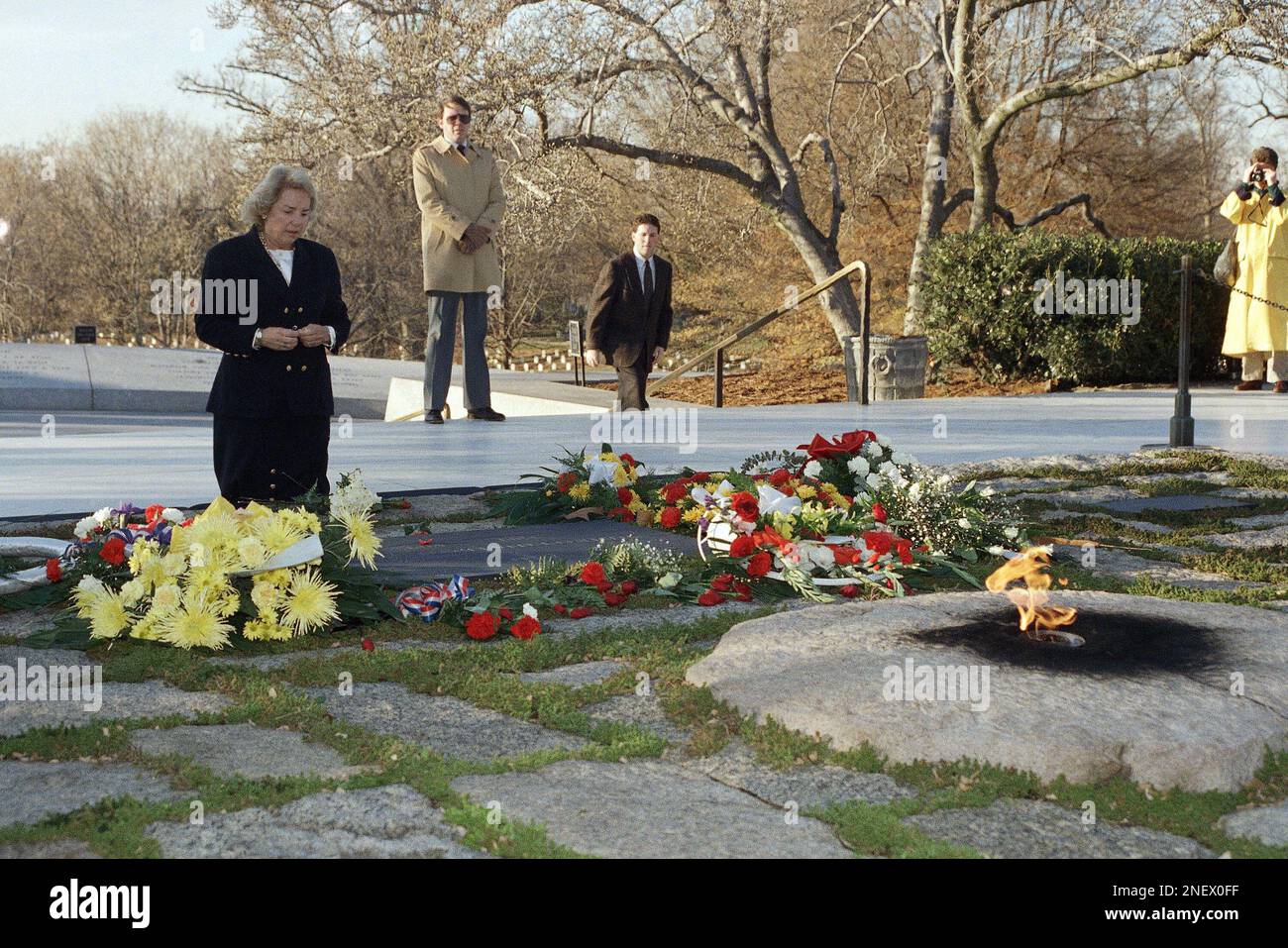 Ethel Kennedy, wife of the late Sen. Robert F. Kennedy, kneels at the grave of the late ...